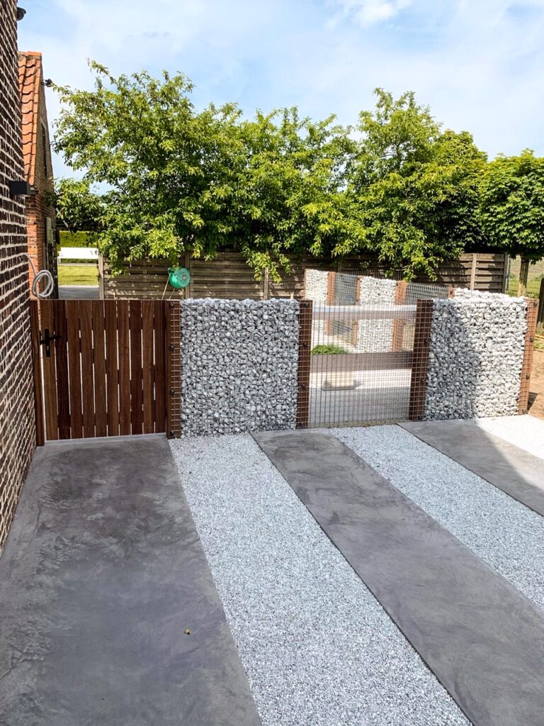 Aanleg terras en afsluiting voor koppelwoningen - karel de sy